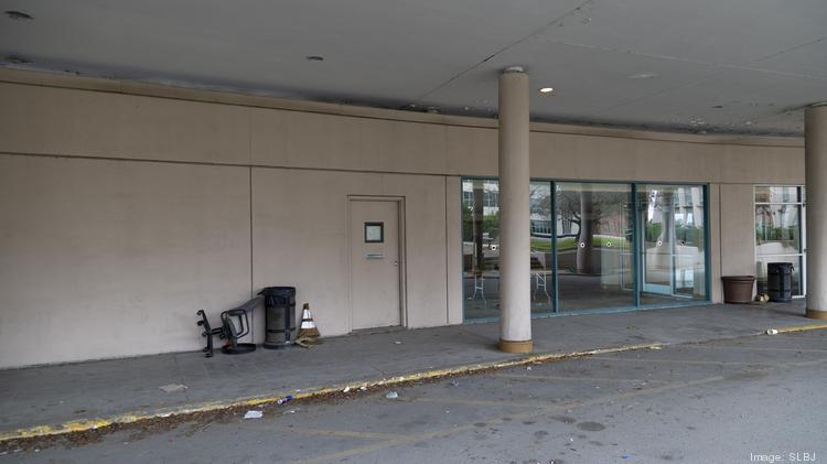 Downtown's vacant Millennium Hotel cited for weeds, graffiti, shot-out ...