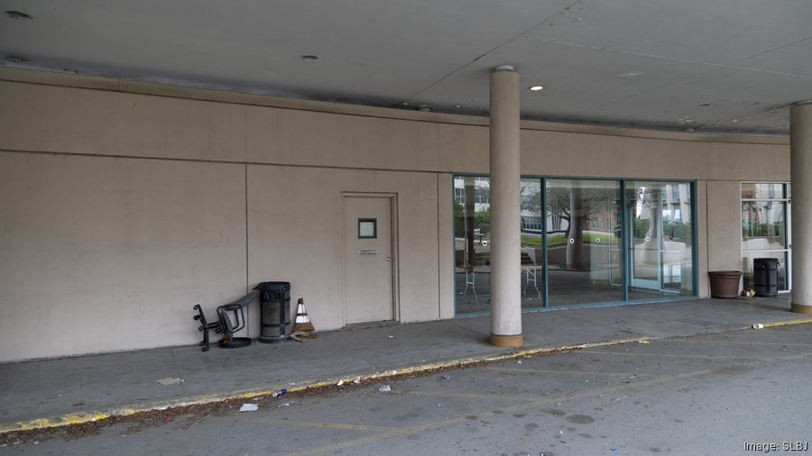 Downtown's vacant Millennium Hotel cited for weeds, graffiti, shot-out window. The fine? Just ...