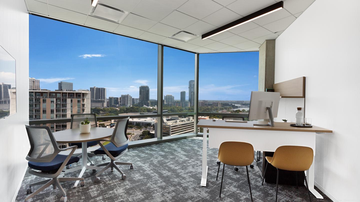 Austin Inno - AlertMedia moves into HQ with airy design, skyline views