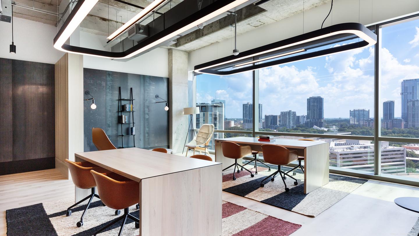 Austin Inno - AlertMedia moves into HQ with airy design, skyline views
