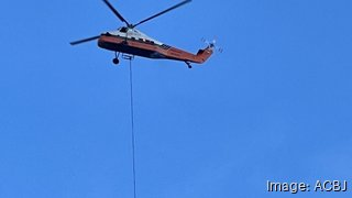 Quarles & Brady unveils new brand name, rooftop sign - Phoenix Business ...