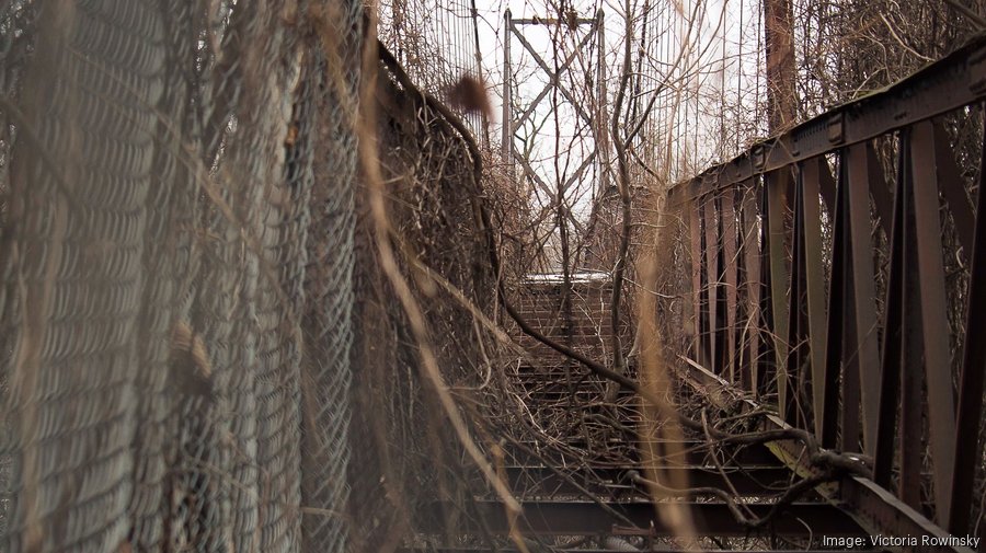 Sidaway Bridge, burnt and abandoned, now a centerpiece of business ...