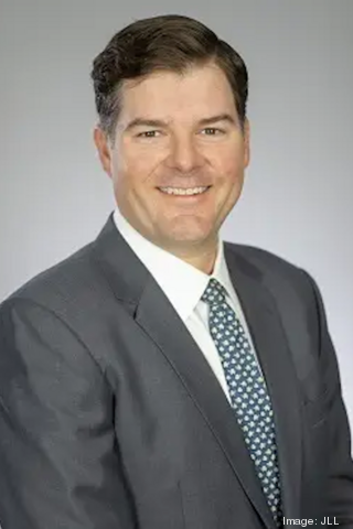 JLL hires Tyler Garrett from Transwestern to lead office agency leasing ...