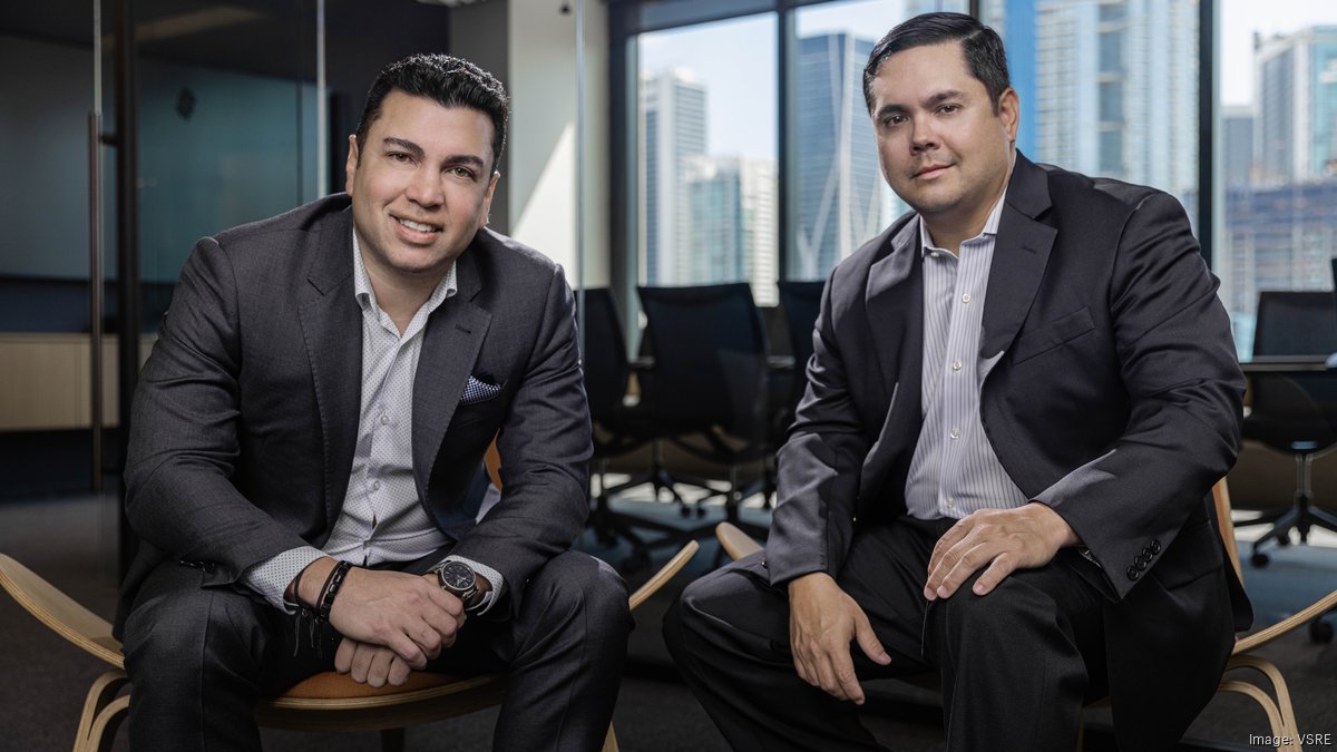 Top executives from Flagler Global Logistics and Vivo Real Estate Group ...