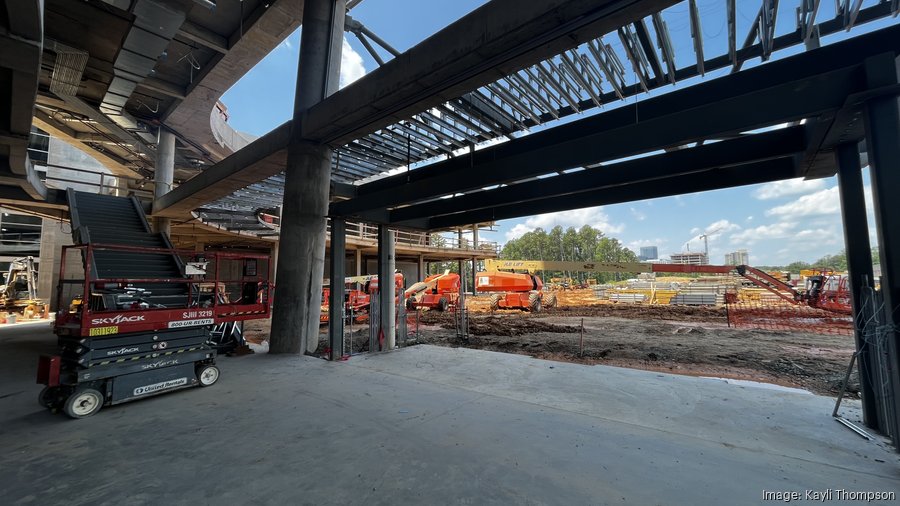 PHOTOS First tower in massive Exchange Raleigh development tops out ...