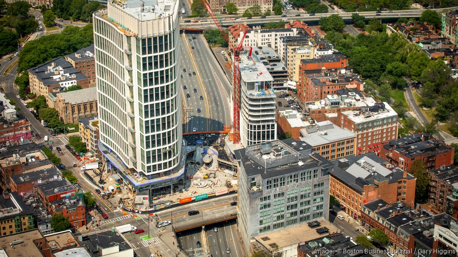 EV retailer to open above the Mass Pike, and more retail news - Boston ...