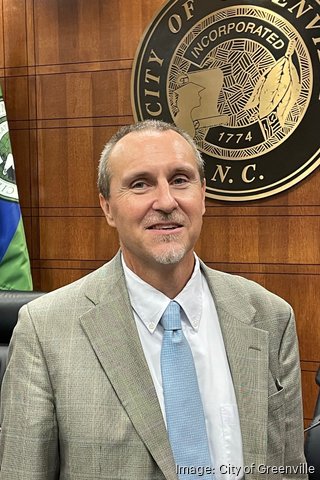 Cary mansion sells. But with big price cut as home market resets ...