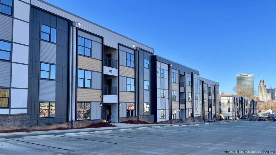 Metropolitan Village milestone: First tenants move into $65M mixed-use ...