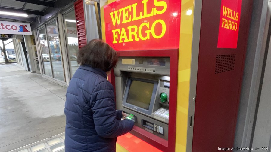 Wells Fargo CFO expects more layoffs, real estate sales - Puget Sound ...
