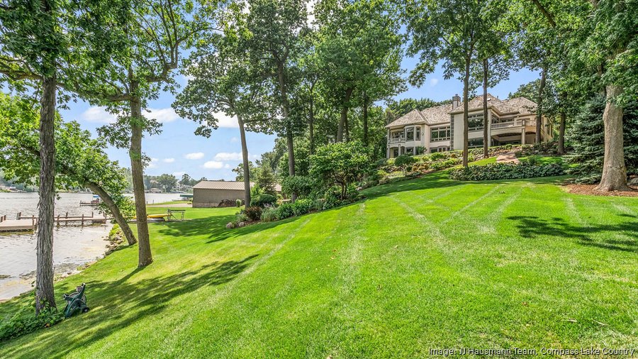 See Delafield lake home with golf simulator listed for $3.5M: Open ...