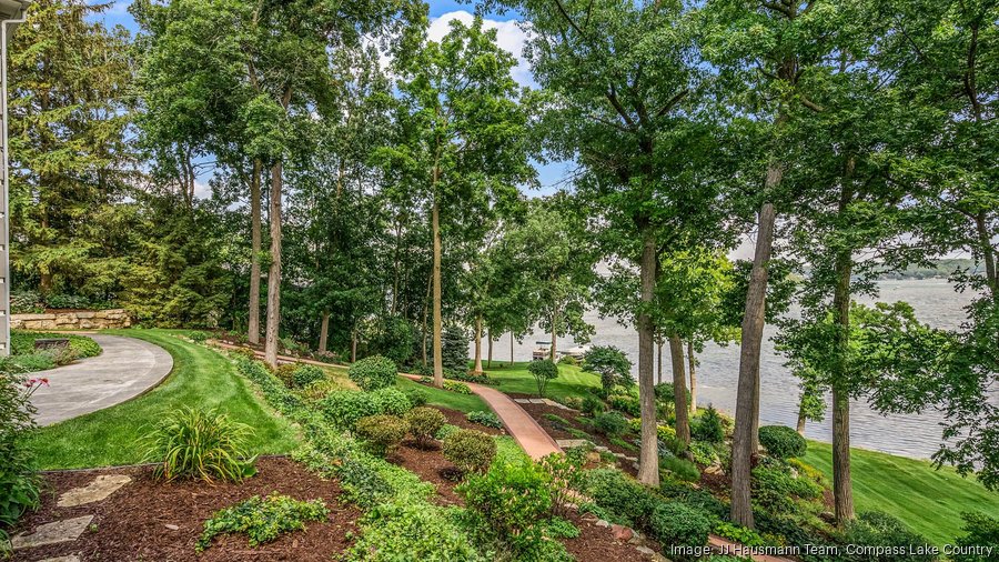 See Delafield lake home with golf simulator listed for $3.5M: Open ...