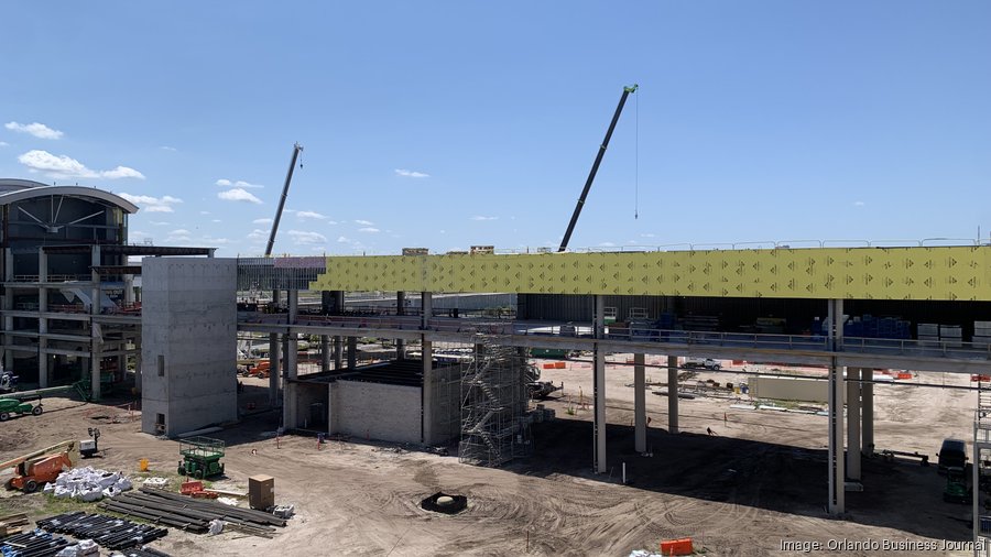 Orlando International Airport Terminal C pedestrian bridge milestone ...