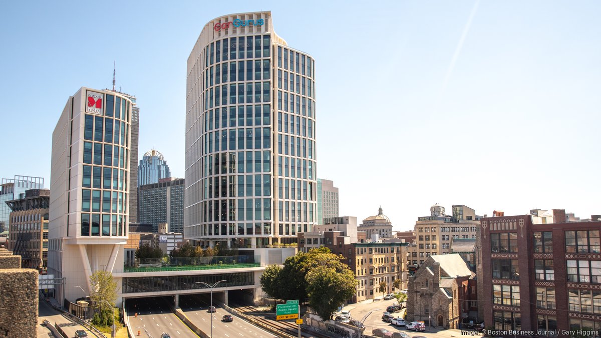 Boston's Parcel 12, Lyrik, opens above the Mass Pike with Rivian ...