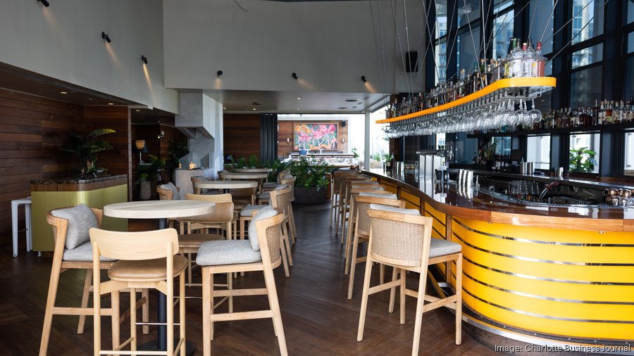 Uptown rooftop restaurant, bar Merchant & Trade unveils revamp ...