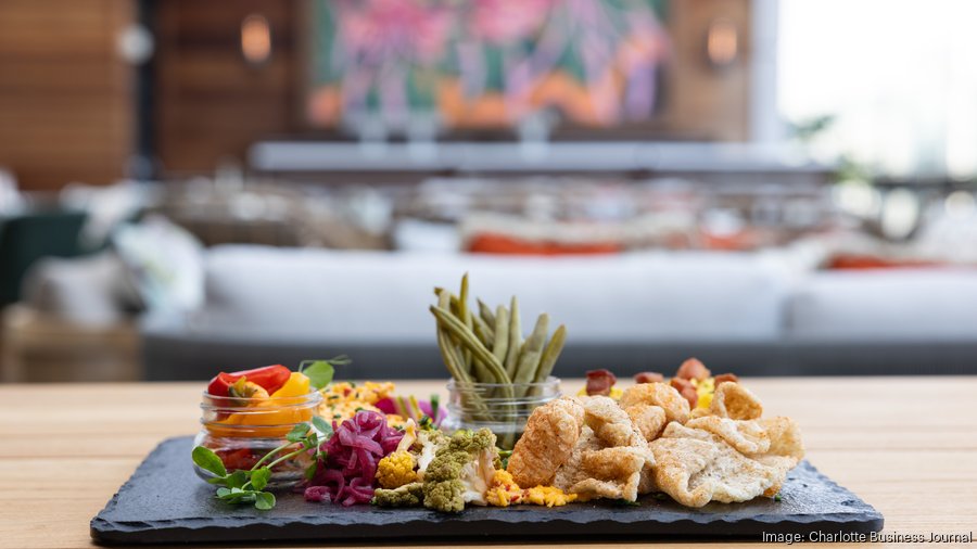 Uptown rooftop restaurant, bar Merchant & Trade unveils revamp ...