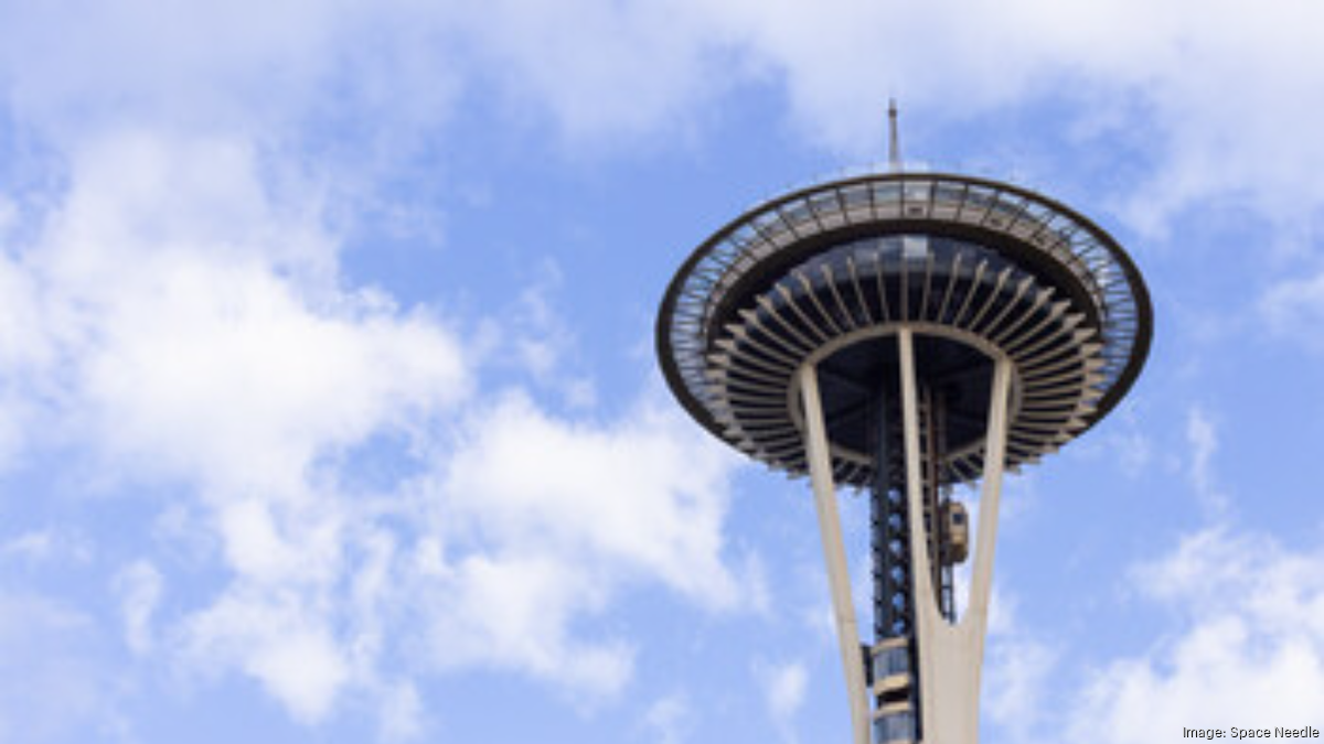 Space Needle debuts glass elevator - Puget Sound Business Journal