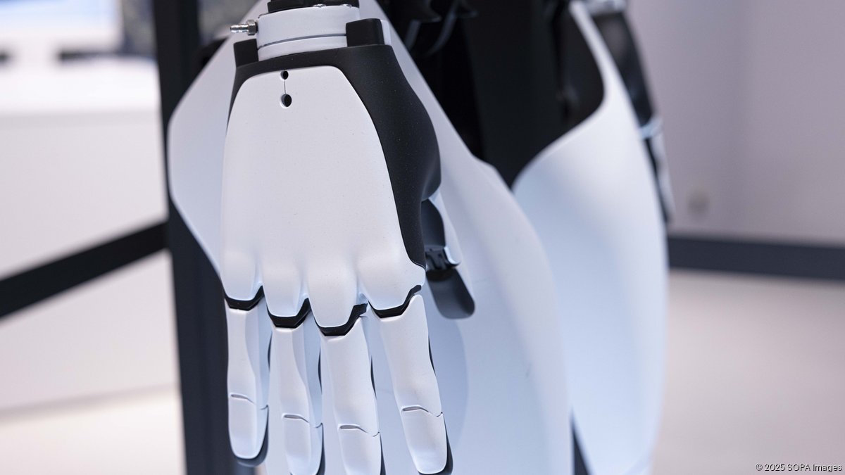 Tesla accuses a Y Combinator startup of stealing its robot hand designs ...