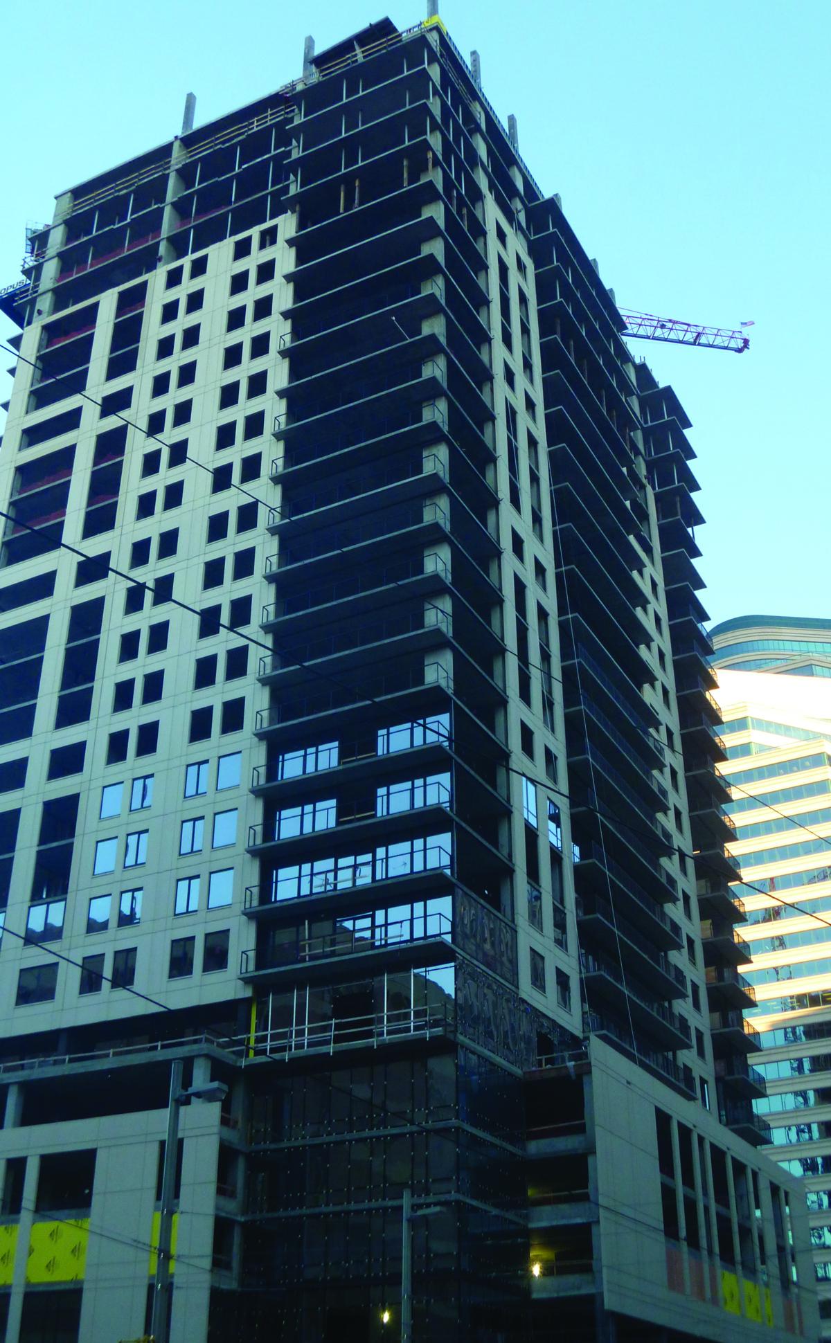 Sam Black: Opus Tower tops out; residents move into Soo Line Building ...
