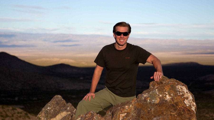 Daniel Burrell stands atop a garnet deposit at the site where he plans ...