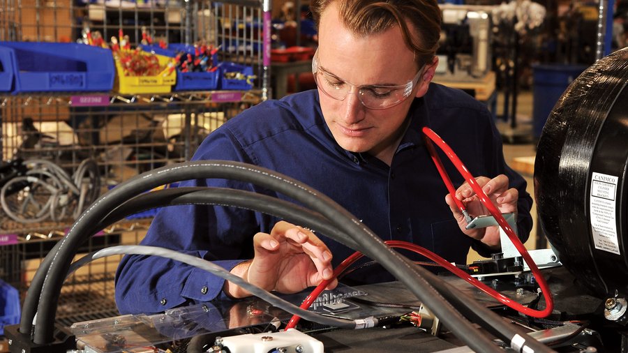 Phillippe Boisvert, a senior engineer at Plug Power, works on a ...