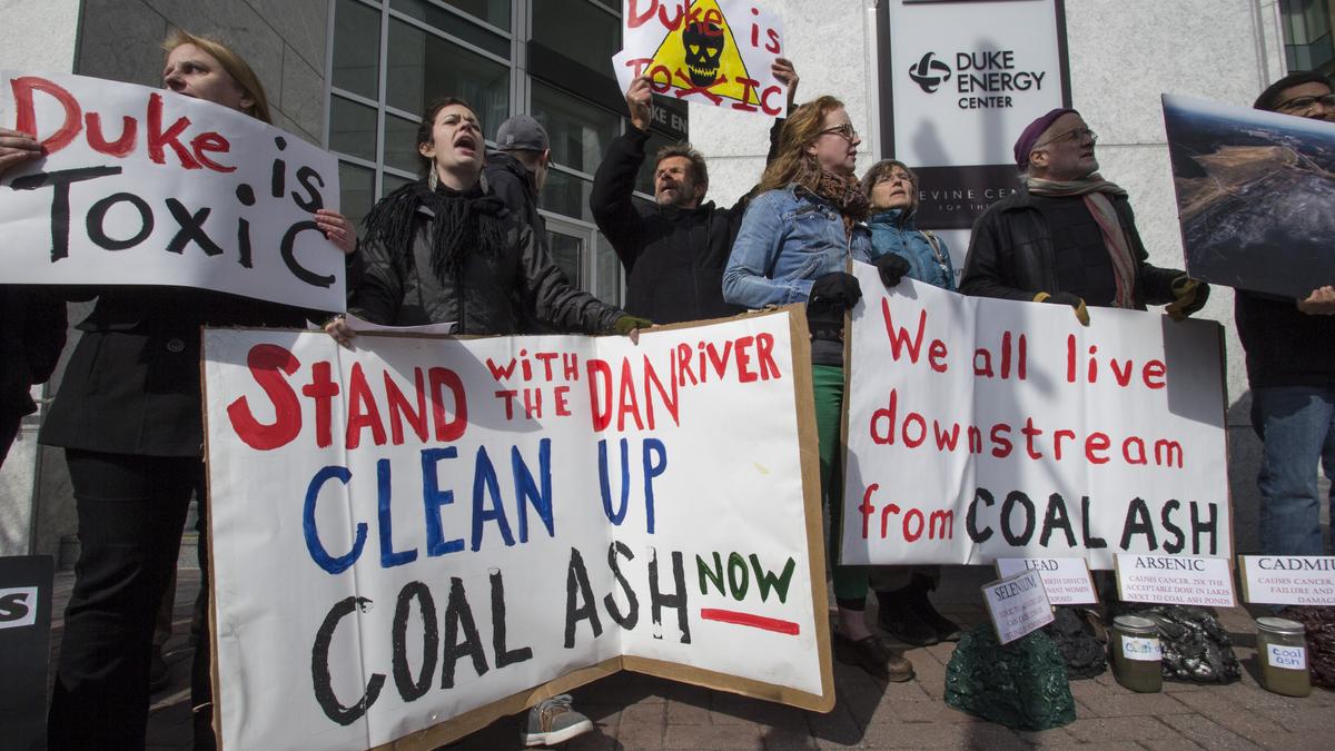 Coal spill sparks protest outside Duke Energy’s HQ in Charlotte ...