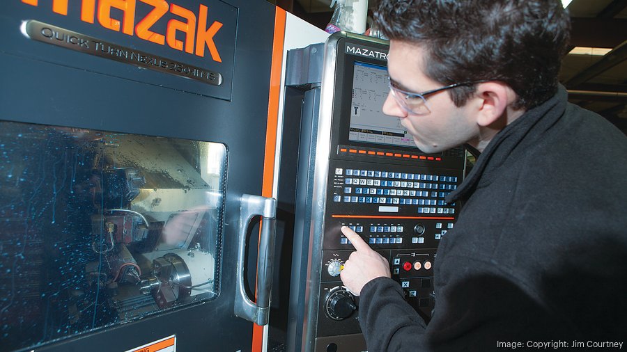 James Serafin II operates one of several machines at his father’s ...