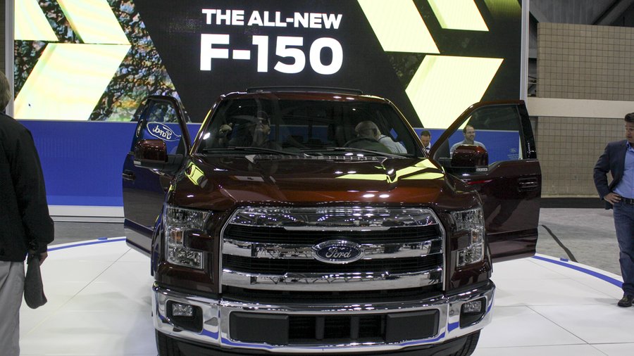Ford Motor Co. unveils its redesigned Ford F-150 pickup at the Kansas ...