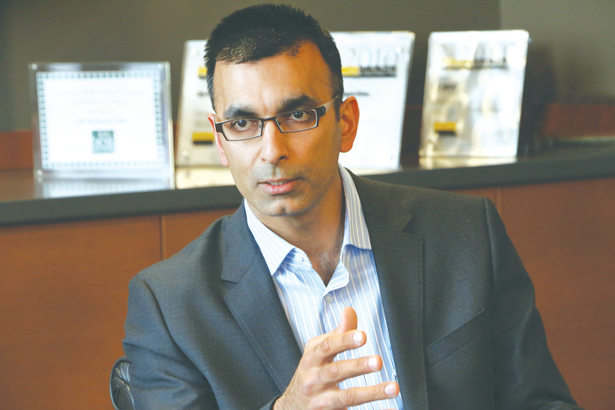 Faces of the list: CBRE 's Ajay Malhotra - Portland Business Journal