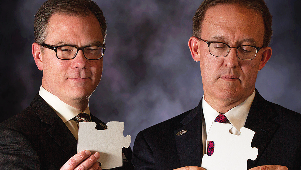 Wesley Medical's Hugh Tappan, Via Christi's Jeff Korsmo working ...