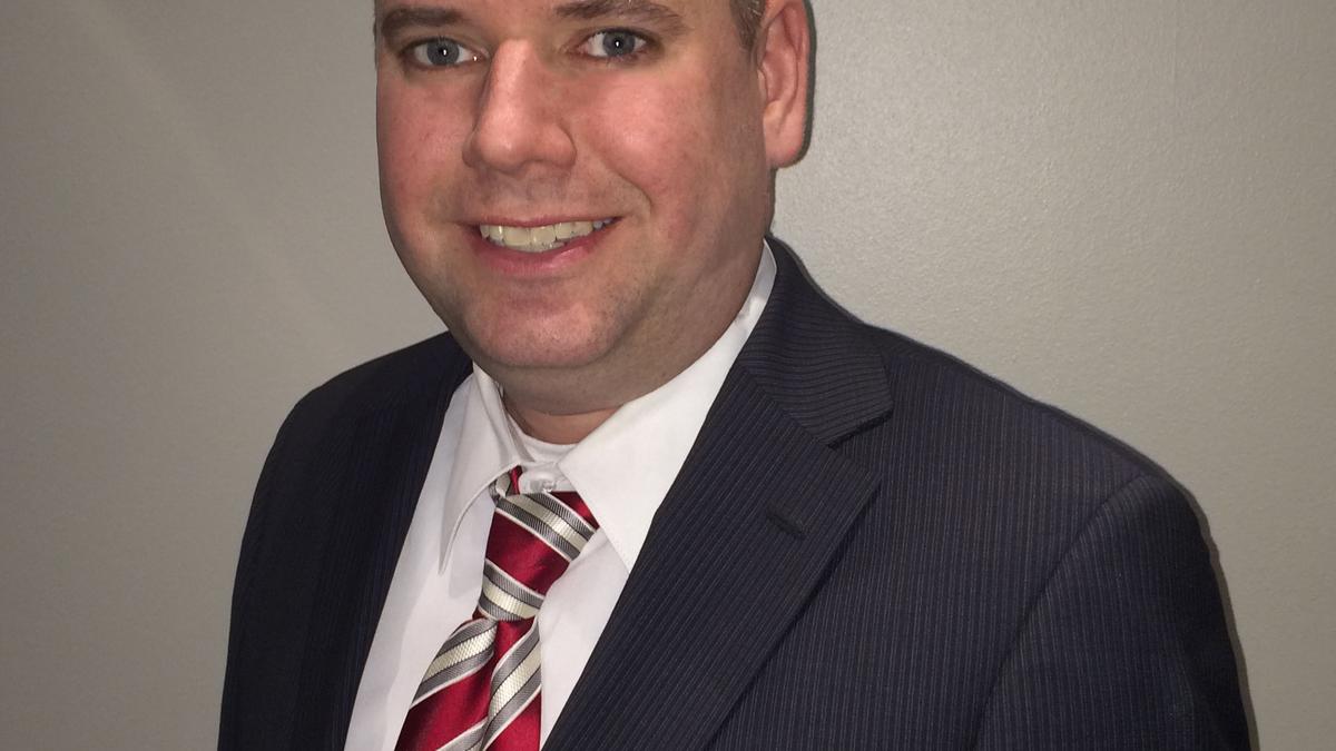 Patriot Bank's compliance officer, Tim Stokes, volunteers at Houston ...