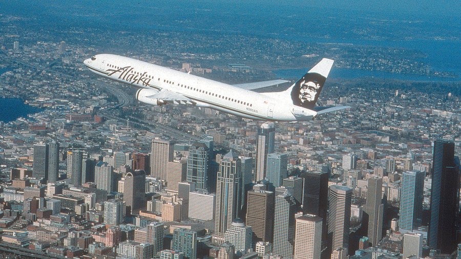 alaska airlines plane over seattle