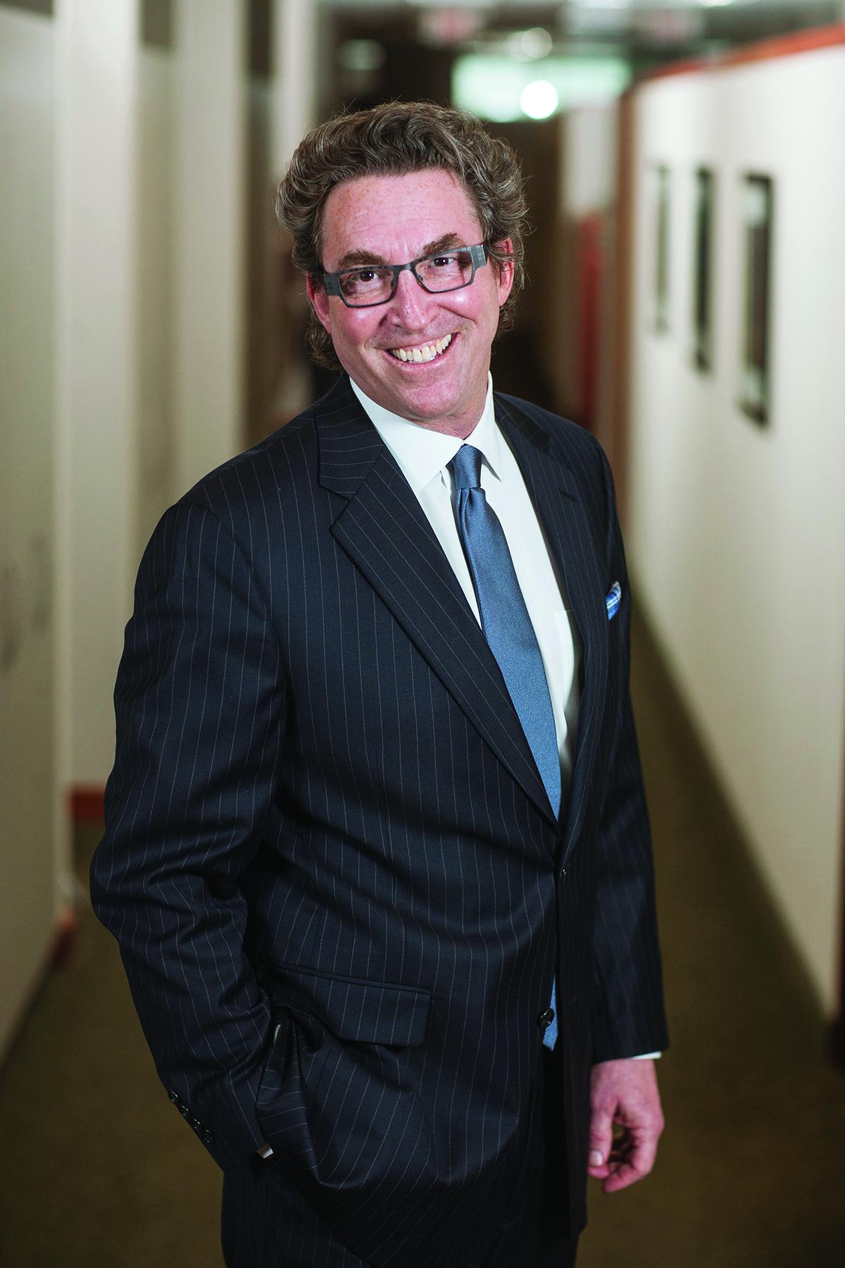 John Levy of Henson & Elfron is co-owner of Andrew Zimmern's AZ Canteen ...