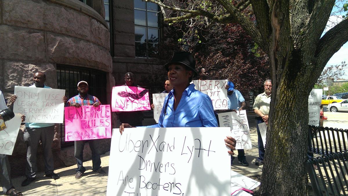 Cincinnati taxi drivers rally against Uber, Lyft - Cincinnati Business ...