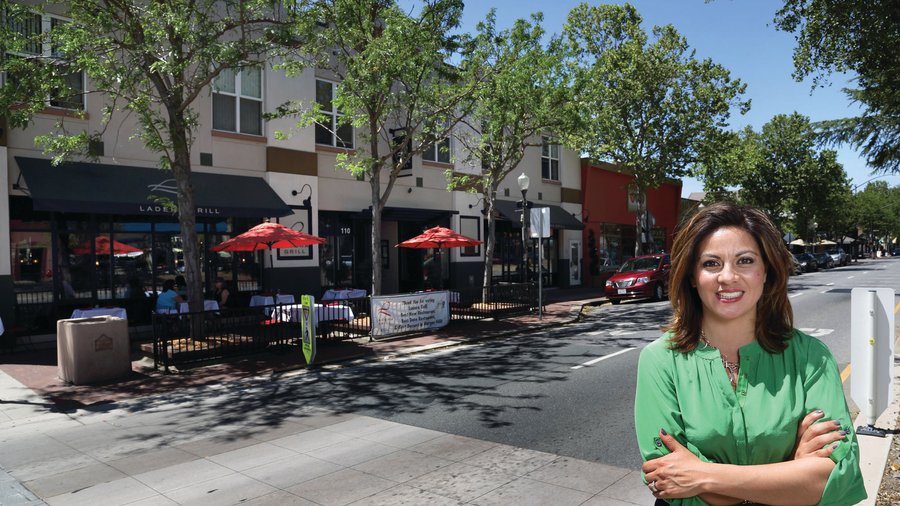 Edith Ramirez, walking in the downtown area, is the chief planner and ...