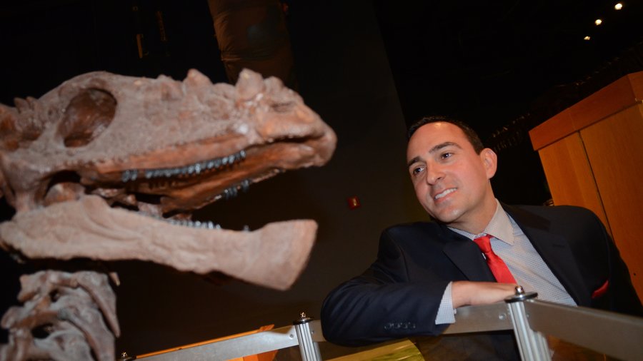 Andre Bailey in the Dino Digs exhibit at Orlando Science Center.