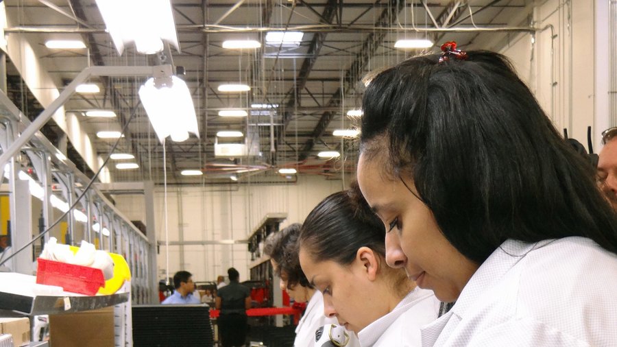 Chinese computer maker Lenovo started its first manufacturing line ...