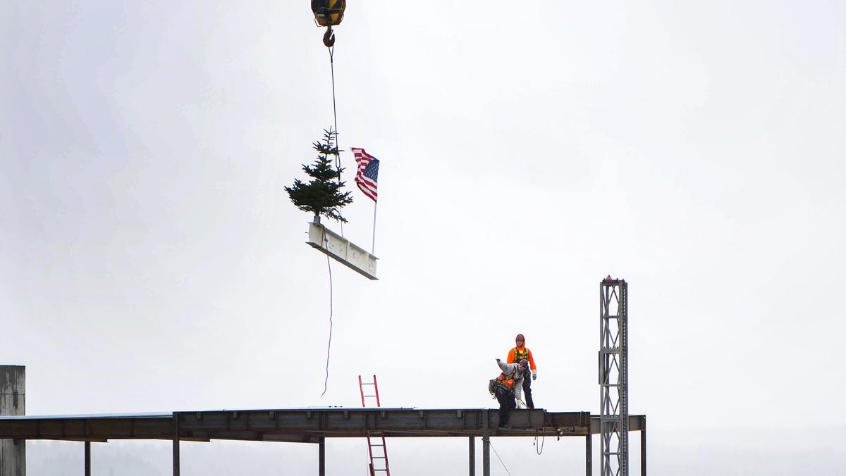 Wind prevents placement of final construction beam, but not the ...