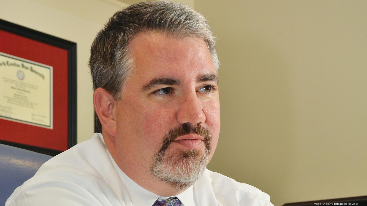 University at Albany athletics director Mark Benson is working to ...