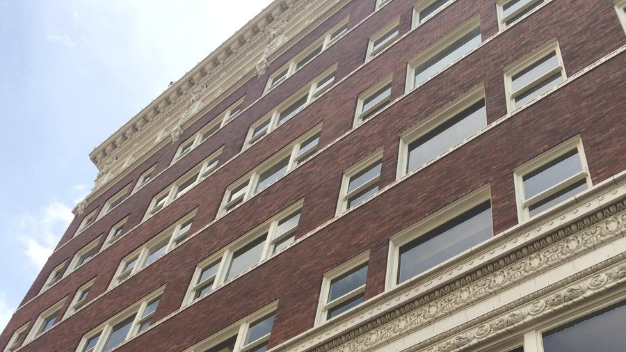 Weston Urban's Randy Smith shows off progress in the Rand Building, a ...