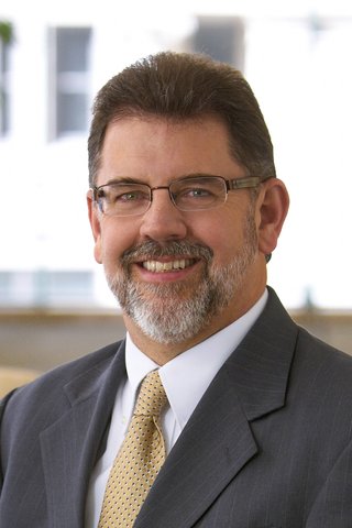 AT&T CFO John Stephens says Donald Trump could boost the company's ...