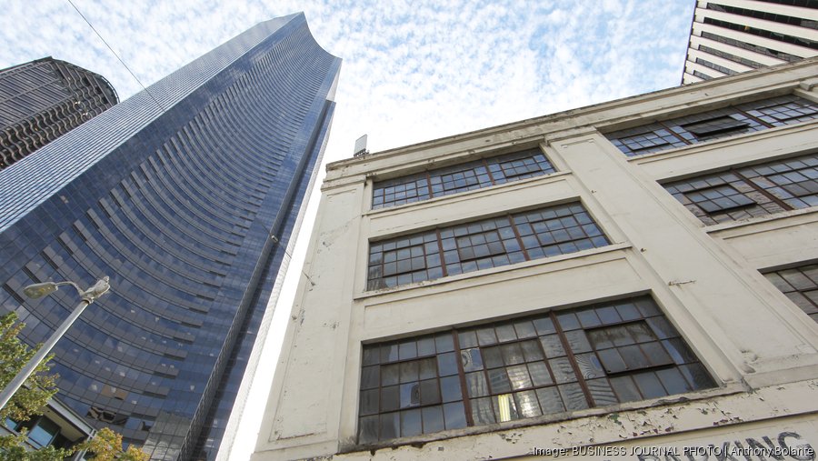 The Columbia Center 76-story skyscraper towers over the 4th Avenue and ...