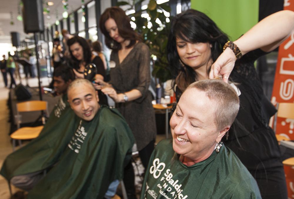 Microsoft employees shave their heads for St. Baldricks - Silicon ...